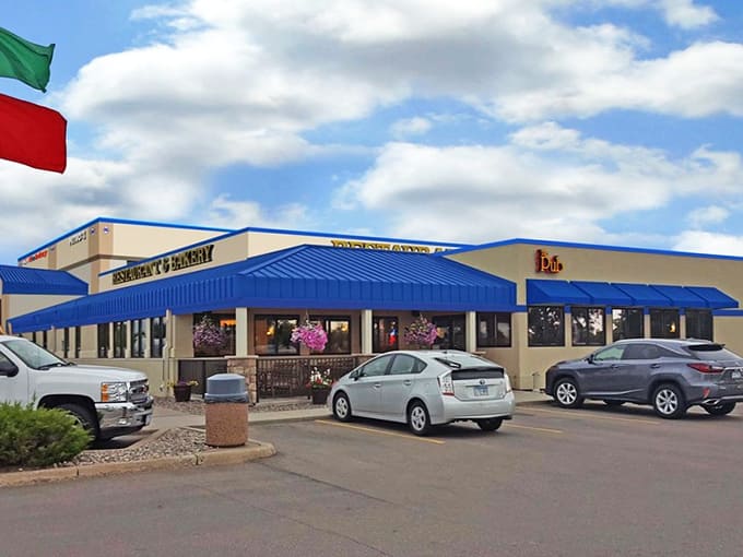 The parking lot welcomes everyone from compact cars to big rigs, because giant donuts don't discriminate based on vehicle size.