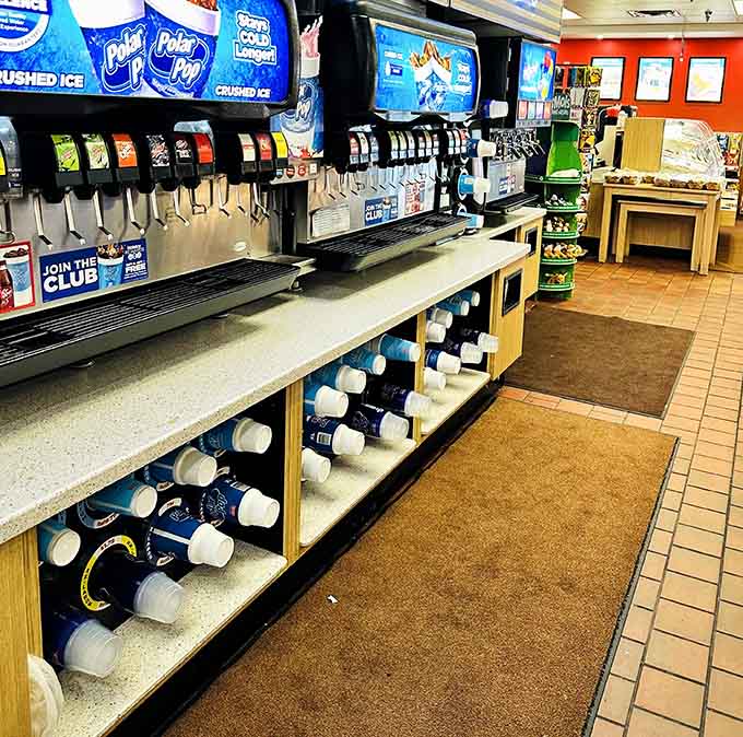 The beverage station where you can fuel up on coffee before loading up on sugar, a perfectly balanced approach.