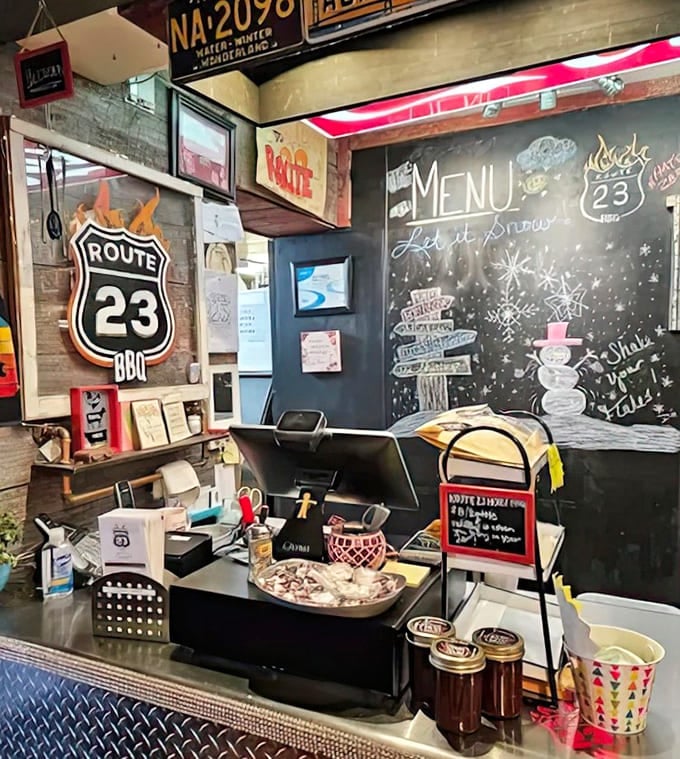 Counter: Where barbecue dreams come true &ndash; the ordering counter showcases Route 23's personality through vintage signs and chalkboard artistry.
