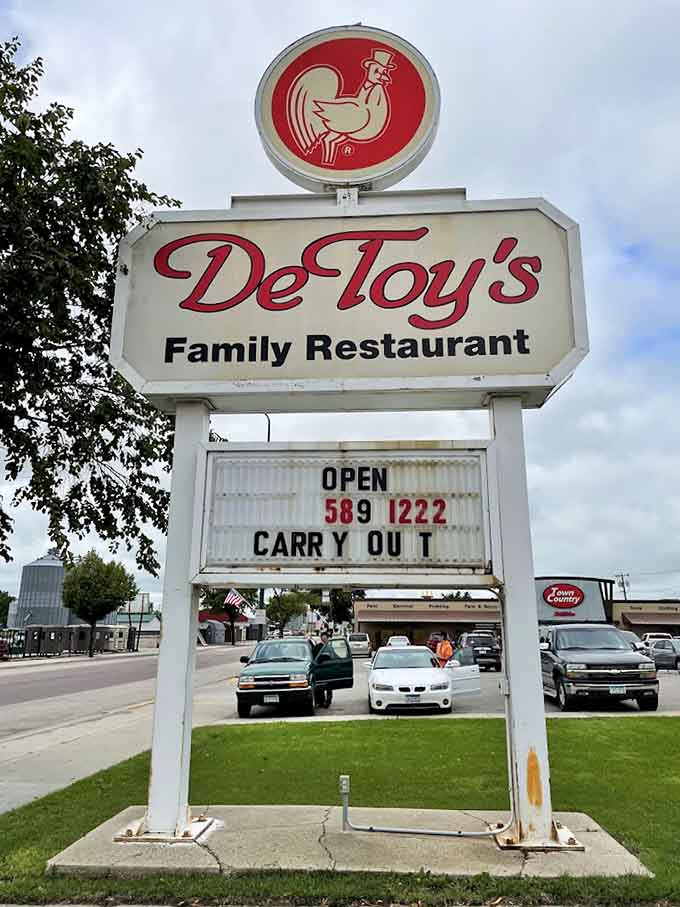The iconic DeToy's sign with its proud rooster, a Morris landmark that's guided countless hungry souls to burger salvation and breakfast bliss.