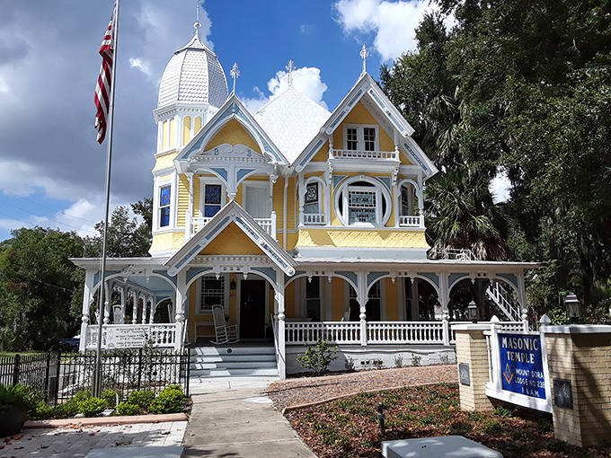 The Donnelly House's Victorian splendor showcases Mount Dora's architectural heritage &ndash; sunshine yellow with gingerbread trim that defies Florida's humidity.