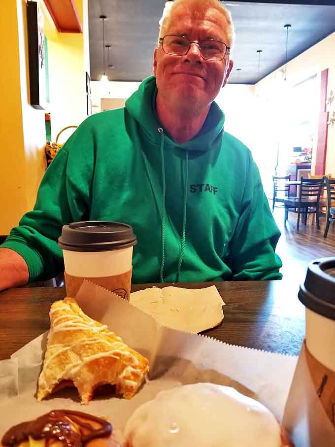 The face of pure contentment, showcasing the universal truth that good pastry makes for happy humans.