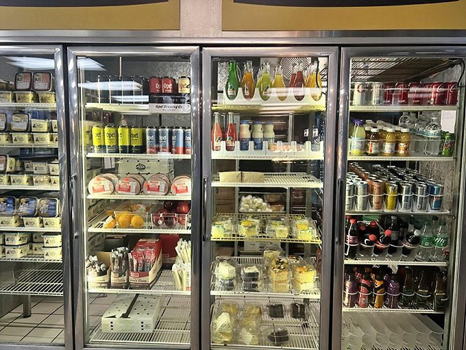 The display case panorama &ndash; a landscape of pastry perfection that makes choosing just one item a delicious impossibility.