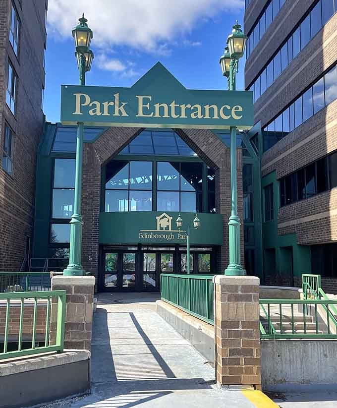 The park entrance sign promises adventure beyond those doors, and unlike most promises, this one actually delivers the goods.