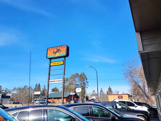 The tall sign ensures you won't miss your destination, guiding hungry travelers to their happy place.