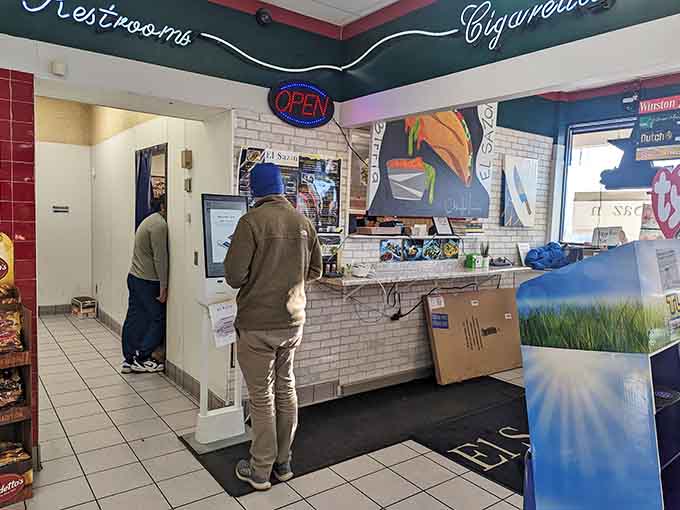 A customer places an order at the counter, where friendly service and genuine hospitality are as much a part of the experience as the food.