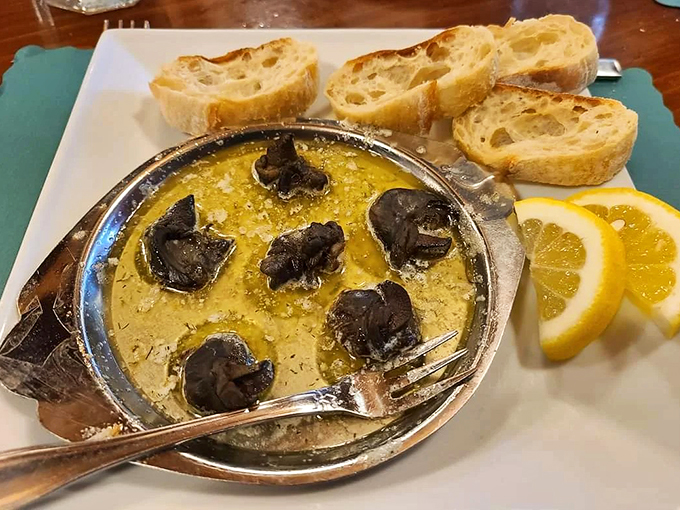 Butter-bathed escargot, ready for their moment in the spotlight. Who knew snails could be so sophisticated?