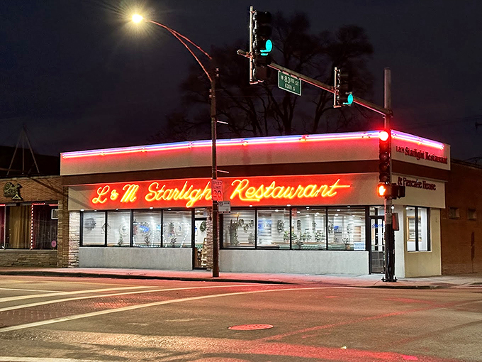 The neon sign glows like a beacon for night owls and early birds alike.