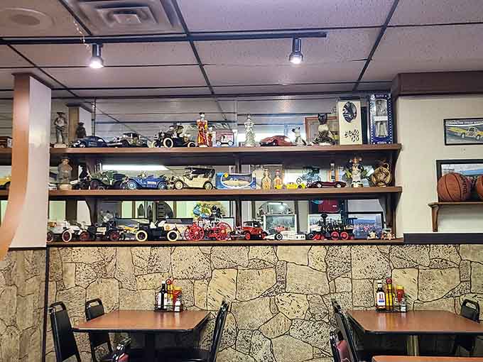 Vintage model cars and collectibles line the shelves, adding character and charm to this beloved community gathering spot.
