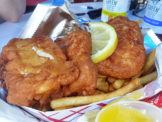 Fish and chips done right &ndash; flaky white fish in a golden batter alongside perfectly crisp fries.
