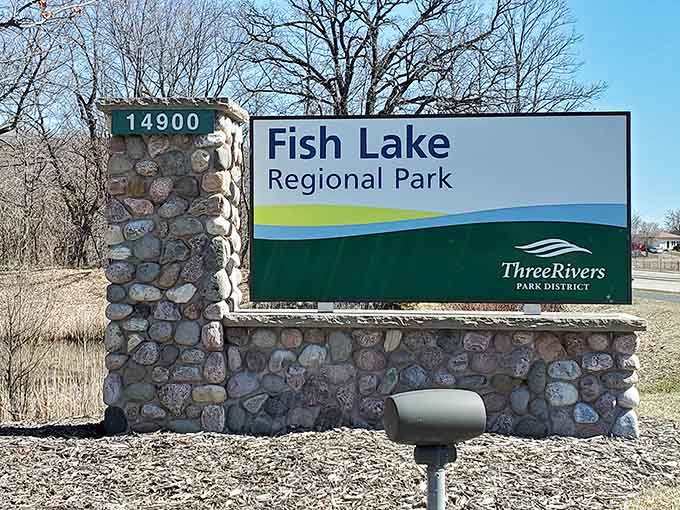 The sign welcomes you to Fish Lake Regional Park, where your only job is to relax and maybe catch something.