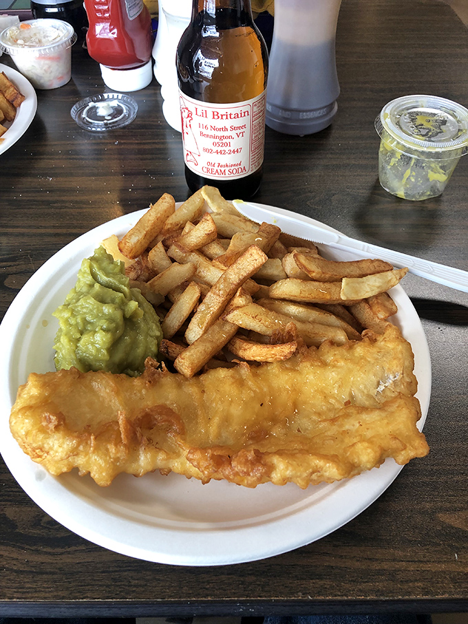 Classic fish and chips &ndash; the cornerstone of British cuisine executed with reverence and skill, golden-battered cod alongside proper thick-cut chips.