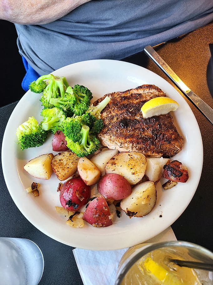 Perfectly seared salmon with roasted potatoes and bright broccoli &ndash; proof that healthy eating can be a celebration rather than a sacrifice.