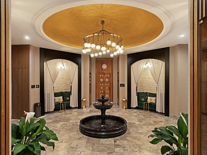 Signage: The elegant H&uuml;rrem logo stands as a beacon of relaxation, like a lighthouse guiding stressed ships to calmer waters.