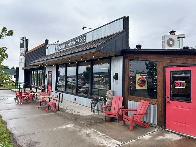 Red outdoor chairs invite guests to dine al fresco, soaking up Grand Marais sunshine between bites of deliciousness.
