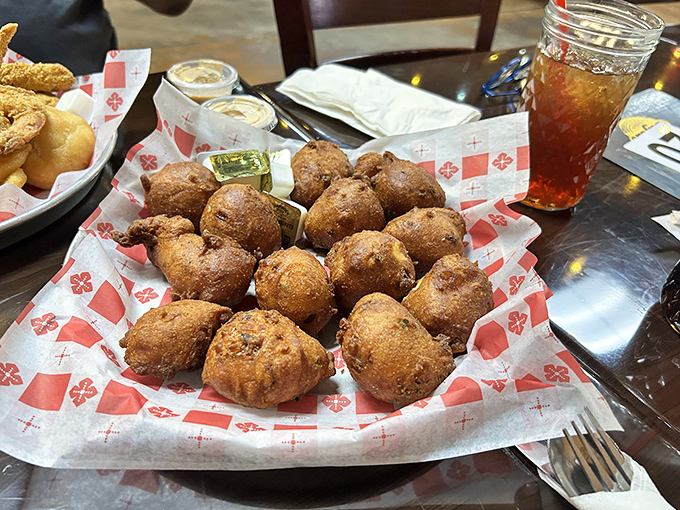 Hushpuppies that actually live up to their name&mdash;golden-fried cornmeal fritters so good they'll silence conversation at your table.