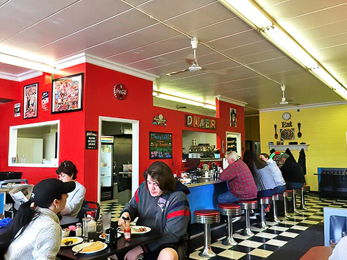 The dining room buzzes with conversation and clinking silverware - a community gathering spot where strangers become neighbors over eggs.