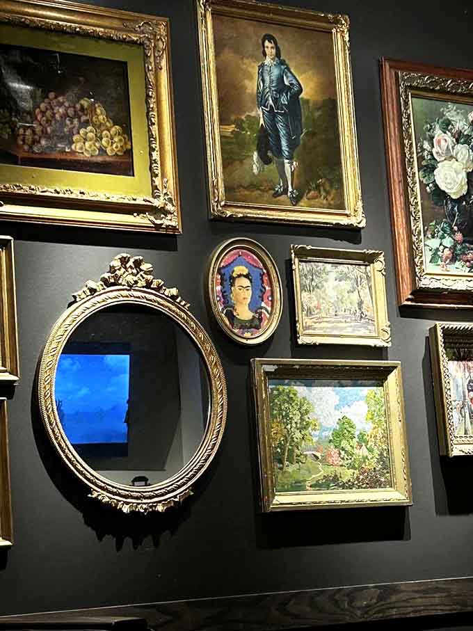 Gallery walls featuring eclectic art give your eyes something interesting to explore between bites of exceptional food.