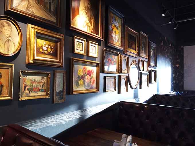 Gallery walls packed with vintage frames add visual interest and give you something to admire between bites of your meal.