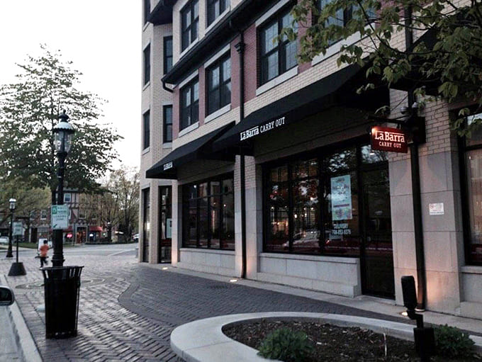 Outdoor seating under twinkling lights turns a simple meal into an al fresco celebration worth remembering.