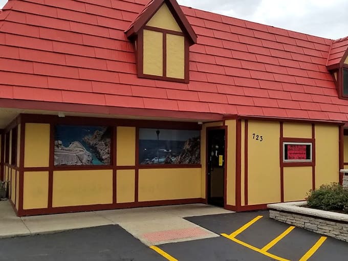 The entrance welcomes you with colorful murals that hint at the authentic Mexican flavors waiting inside this unassuming building.