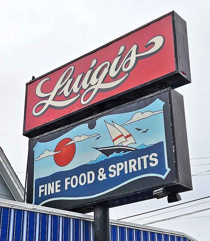 Luigi's iconic signage promises "Fine Food & Spirits" &ndash; a modest claim that understates the culinary treasures awaiting inside this beloved local institution.