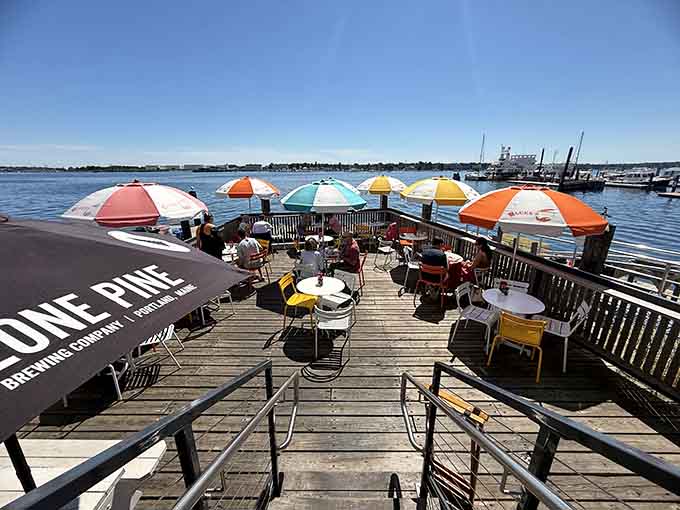 Colorful umbrellas dot the outdoor deck where sunshine and sea breezes make every bite taste even better than it already does.