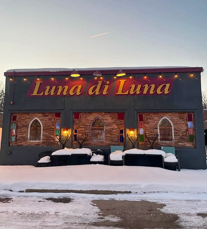 The outdoor seating area by day shows off those charming arched windows and proves this restaurant looks good from every angle, any time.