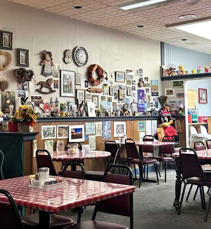 The eclectic wall decorations range from family photos to quirky collectibles, giving your eyes something interesting while you wait.