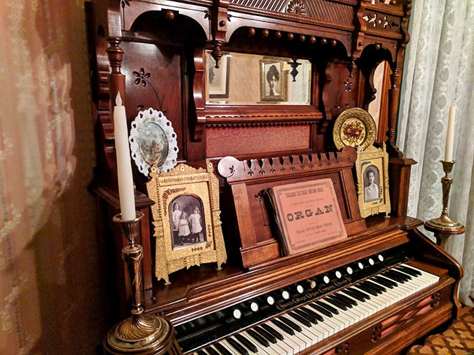 A trip down memory lane! This organ is a time capsule of tunes, family photos, and knick-knacks that would make any antique collector swoon.