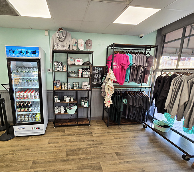 The merchandise corner proves these aren't just donuts, they're a lifestyle &ndash; complete with branded gear for the truly devoted Holy Donut disciples.