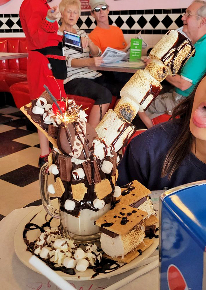 Holy moly, that's not a milkshake—it's a milkscapade! This towering treat is what happens when dessert goes to Superhero School.