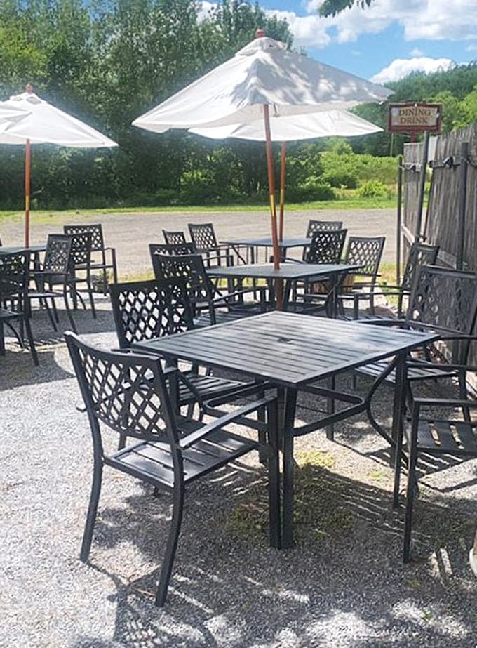 Outdoor patio seating with mountain views lets you enjoy your meal while soaking up that Maine sunshine.