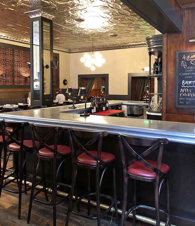 Bar seating for those who prefer to watch the action while enjoying their meal and a well-crafted beverage.