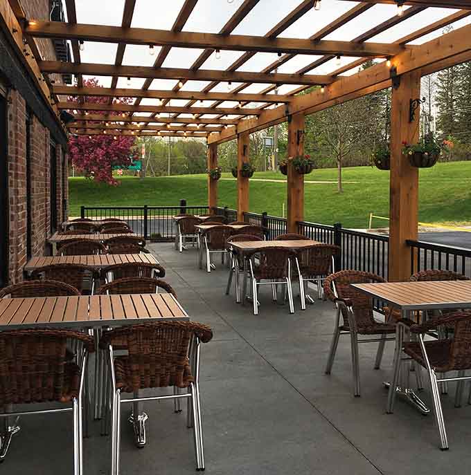 The covered patio extends your dining options outdoors, offering a pleasant spot to enjoy your meal when Minnesota weather decides to cooperate.