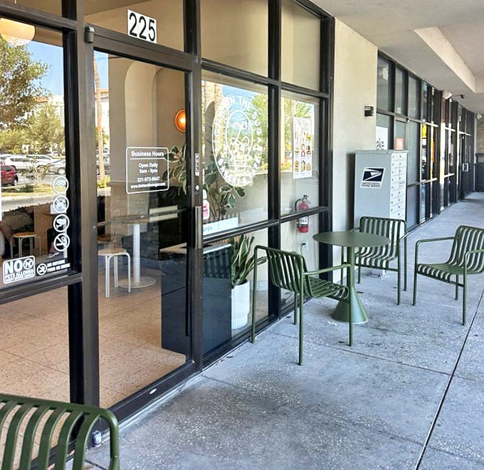 Outdoor Seats: Green chairs invite you to bask in Florida sunshine while contemplating the meaning of life &ndash; or just how many pastries you can reasonably eat.
