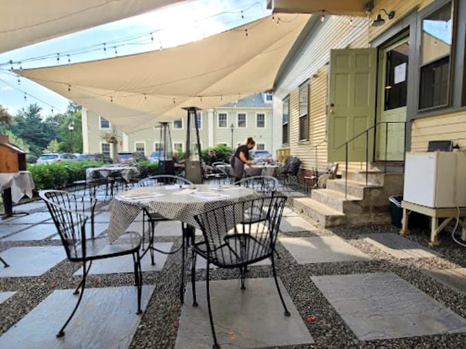 The perfect spot for a Vermont summer evening, where string lights and shade sails create an almost Mediterranean atmosphere.