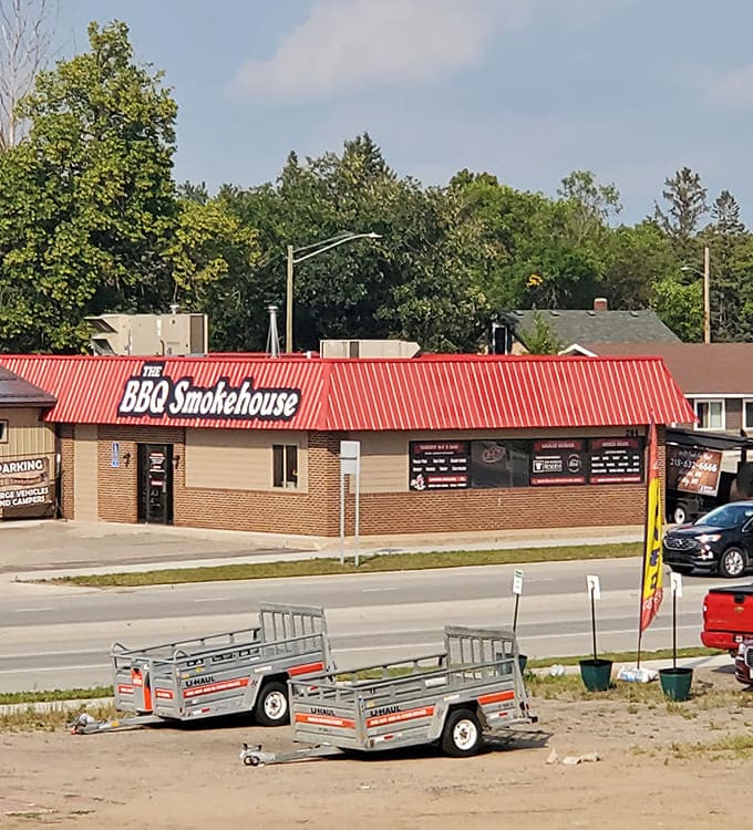 The building sits proudly on its corner lot, a beacon of BBQ excellence in the Minnesota landscape.