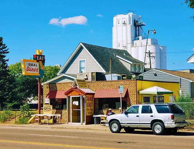 The cheerful yellow exterior and vintage architecture make Ideal Diner a neighborhood landmark, the kind of place that anchors a community and gives it character.