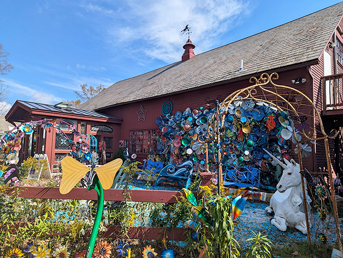 The exterior view reveals a traditional Vermont barn with a rebellious streak &ndash; where rustic charm meets artistic explosion in a celebration of creative contradiction.