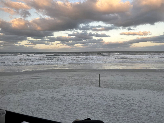 Nature's own light show puts on a daily performance, with waves providing the soundtrack and clouds painting the sky.