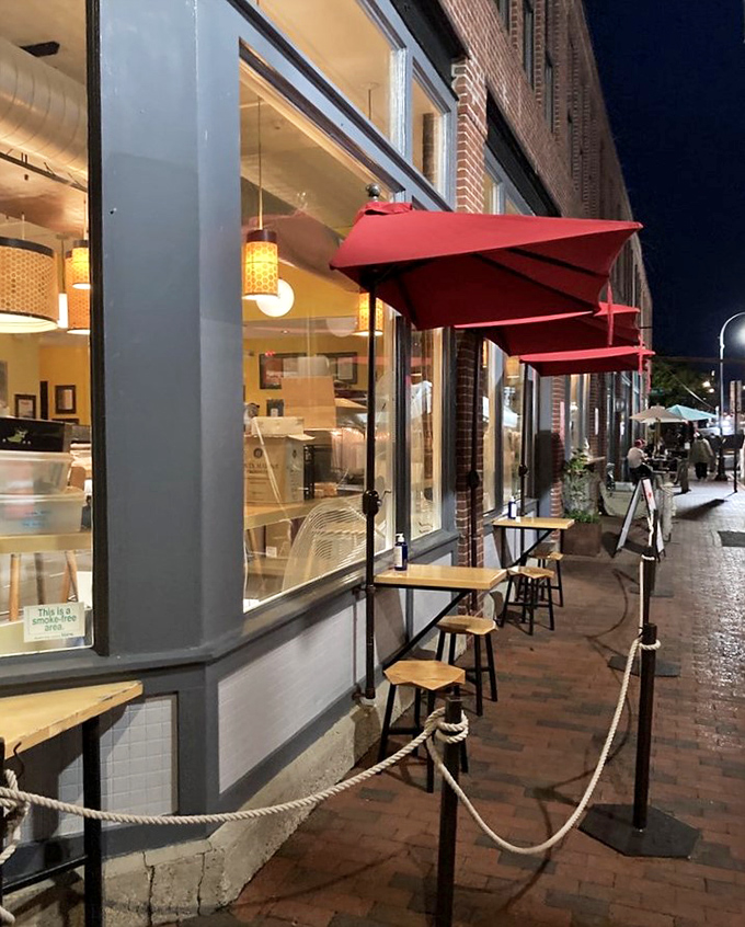 Red umbrellas stand guard over sidewalk tables where lucky diners can slurp noodles al fresco while watching Portland life unfold along brick sidewalks.