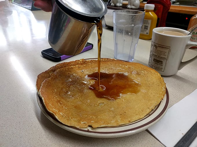 Breakfast theater at its finest &ndash; watch as maple syrup cascades down the sides of this golden disc of morning perfection.