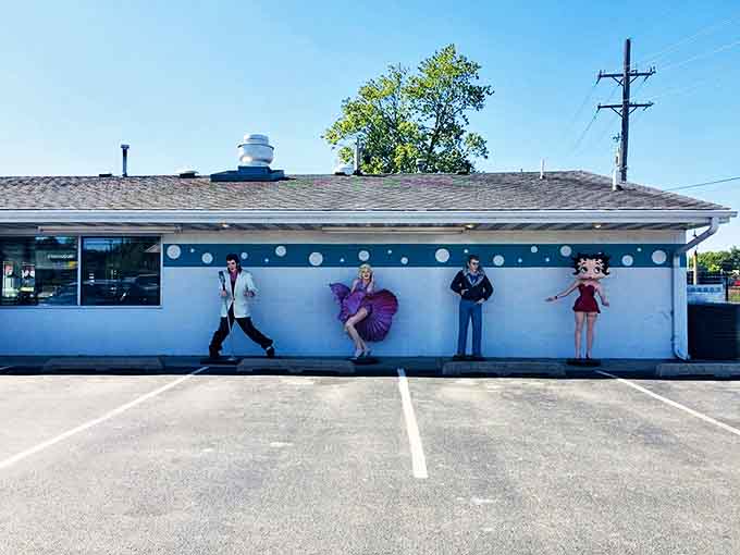 That mural outside celebrates the golden age of entertainment, setting the stage for your own memorable dining experience.