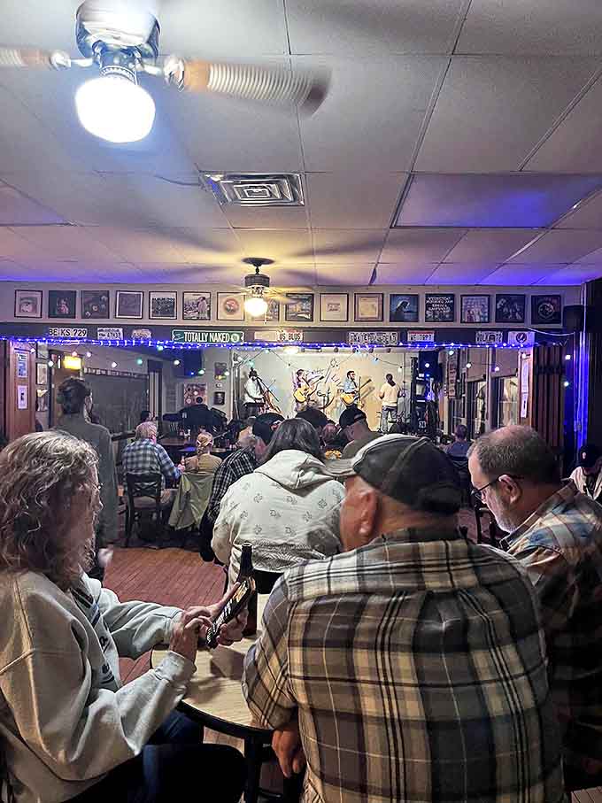Patrons gather in anticipation as musicians take the stage, creating that perfect moment when food, music, and community converge.