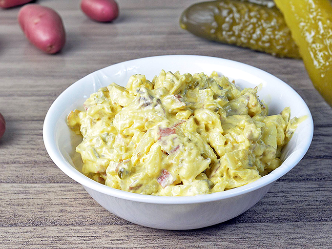 Creamy, dreamy, and oh-so-tempting! This potato salad is the unsung hero of barbecues &ndash; always invited, always devoured.