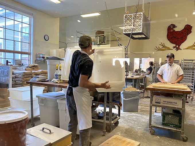 Behind the scenes, skilled bakers work their magic, transforming simple ingredients into crusty, golden perfection daily.