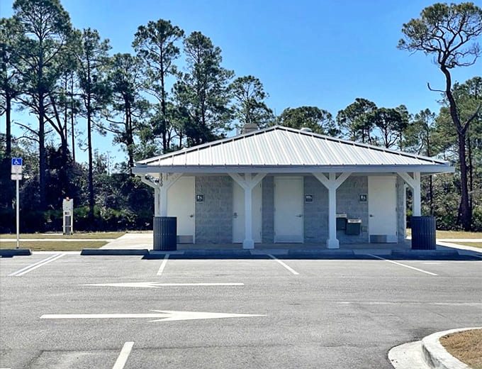 Even the restroom facilities maintain the park's understated charm, blending harmoniously with the natural surroundings.
