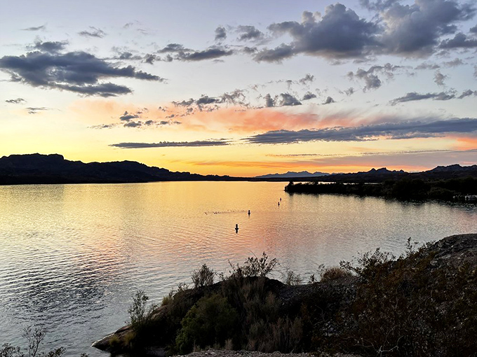 As the sun sets over Lake Havasu, the water takes on golden hues that transform Cattail Cove into a photographer's dream landscape.