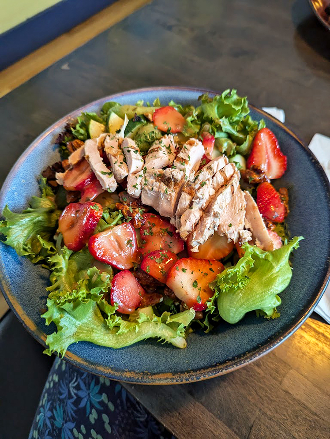 A fresh strawberry salad with grilled chicken that makes eating your greens feel like a reward, not a chore.